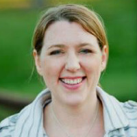 Linsey Knerl, Finance Writer